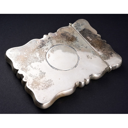 A George V plain silver shaped card case, vacant circular cartouche ...