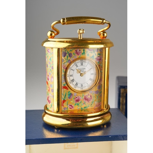 Four various Halcyon Days quartz movement clocks, comprising a ...