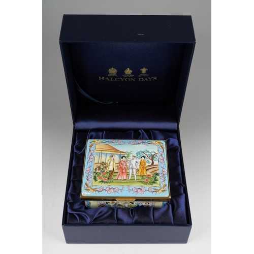 A boxed Halcyon Days enamel and porcelain limited edition musical box ...