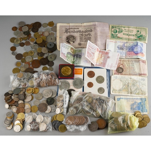 A bag of assorted World coins and banknotes, including a small ...