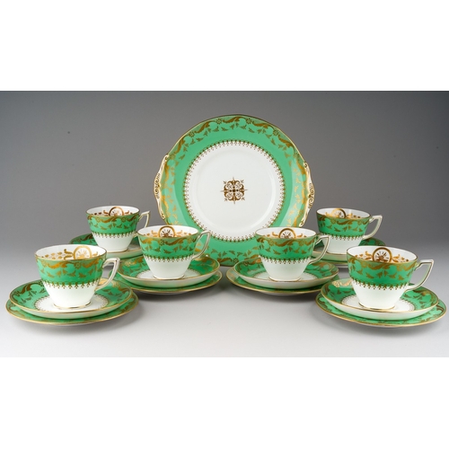 An early 20th century Minton tea set, green ground with gilt decoration ...