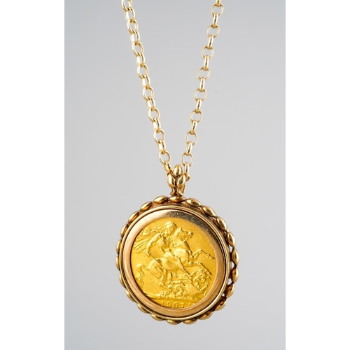 A 9ct gold full sovereign pendant with chain. The 9ct gold pendant with ...