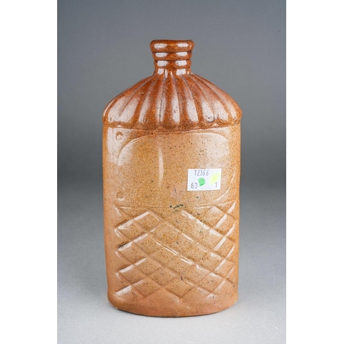 A 19th century stoneware flask, each side with lattice work to the ...
