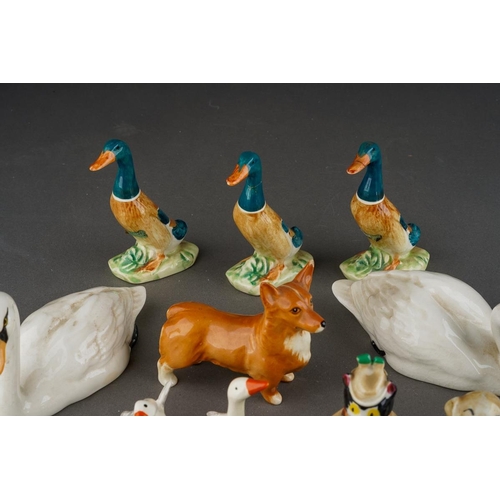 A collection of Beswick to two swans 1684, 1685; model of two geese ...