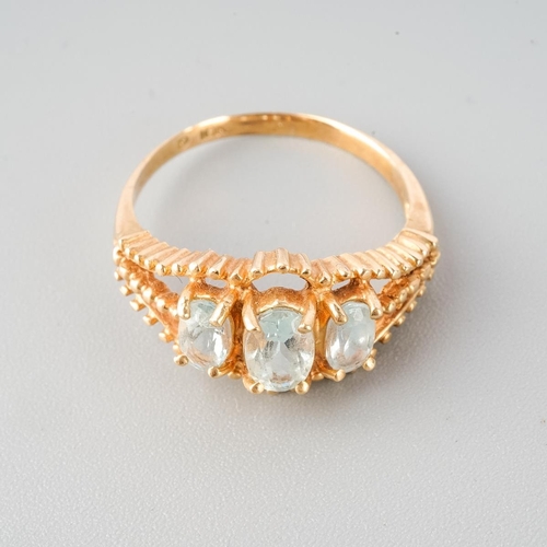 A gem set ring. Stamped 10k, approx ring size N, approx gross weight 2. ...
