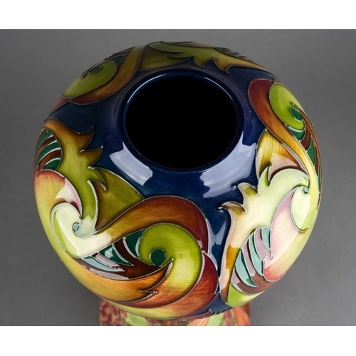 A Moorcroft pottery trial inverted baluster vase in the Trees and Field ...