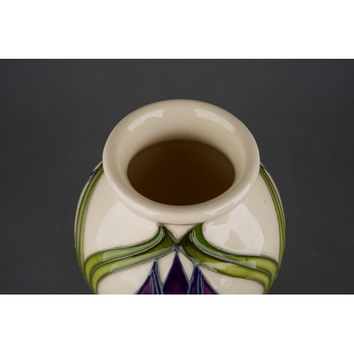 A Moorcroft pottery Tulip Nouveau limited edition inverted baluster ...