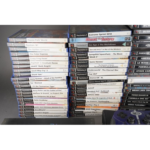 Three boxes of PlayStation and PlayStation 2 games, console and other ...