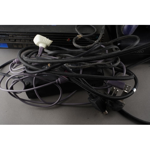 Three boxes of PlayStation and PlayStation 2 games, console and other ...