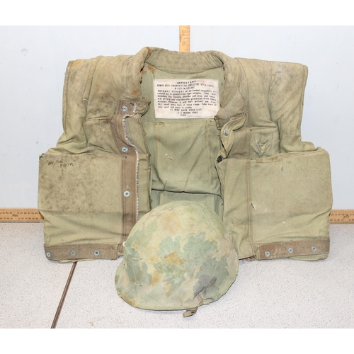 A post WW2 period American army helmet with liner and 1955 dated Marine ...