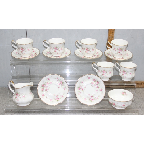 A vintage Paragon "Victoriana Rose" pattern 6 person tea set with milk ...