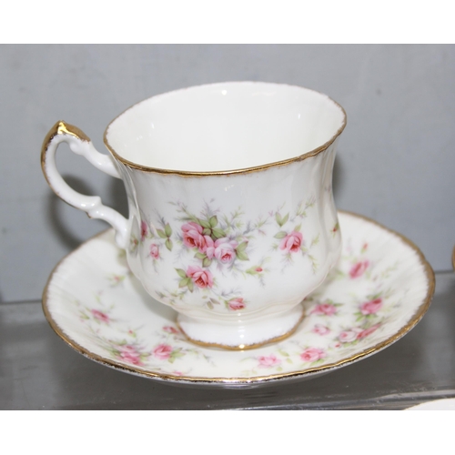 A vintage Paragon "Victoriana Rose" pattern 6 person tea set with milk ...