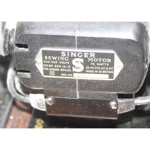 Vintage Singer electric sewing machine in case with key and associated ...