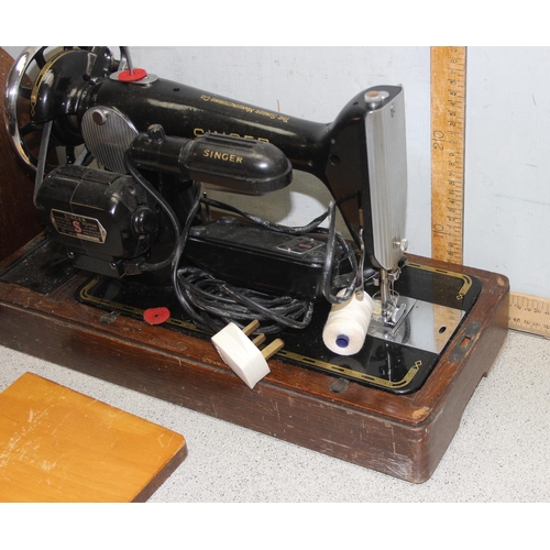 Vintage Singer electric sewing machine in case with key and associated ...