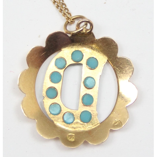 An 18ct gold and turquoise pendant necklace formed as a D, the pendant ...