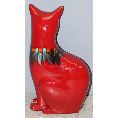 Poole Pottery, a red glazed figure of a cat, approx 29cm tall