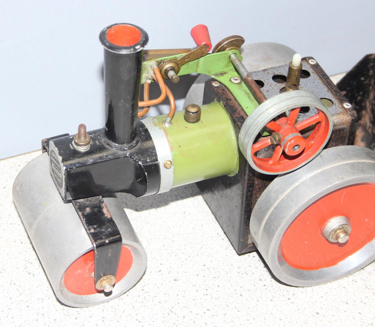 A vintage Mamod steam roller with trailer