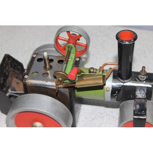 A vintage Mamod steam roller with trailer