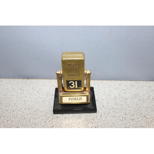 Antique perpetual desk calendar in oak glazed case and a smaller brass ...