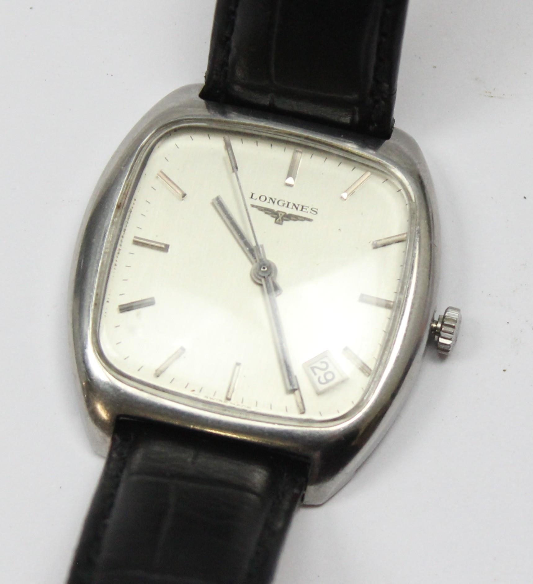 A vintage Longines watch with cushion shaped square face, baton ...