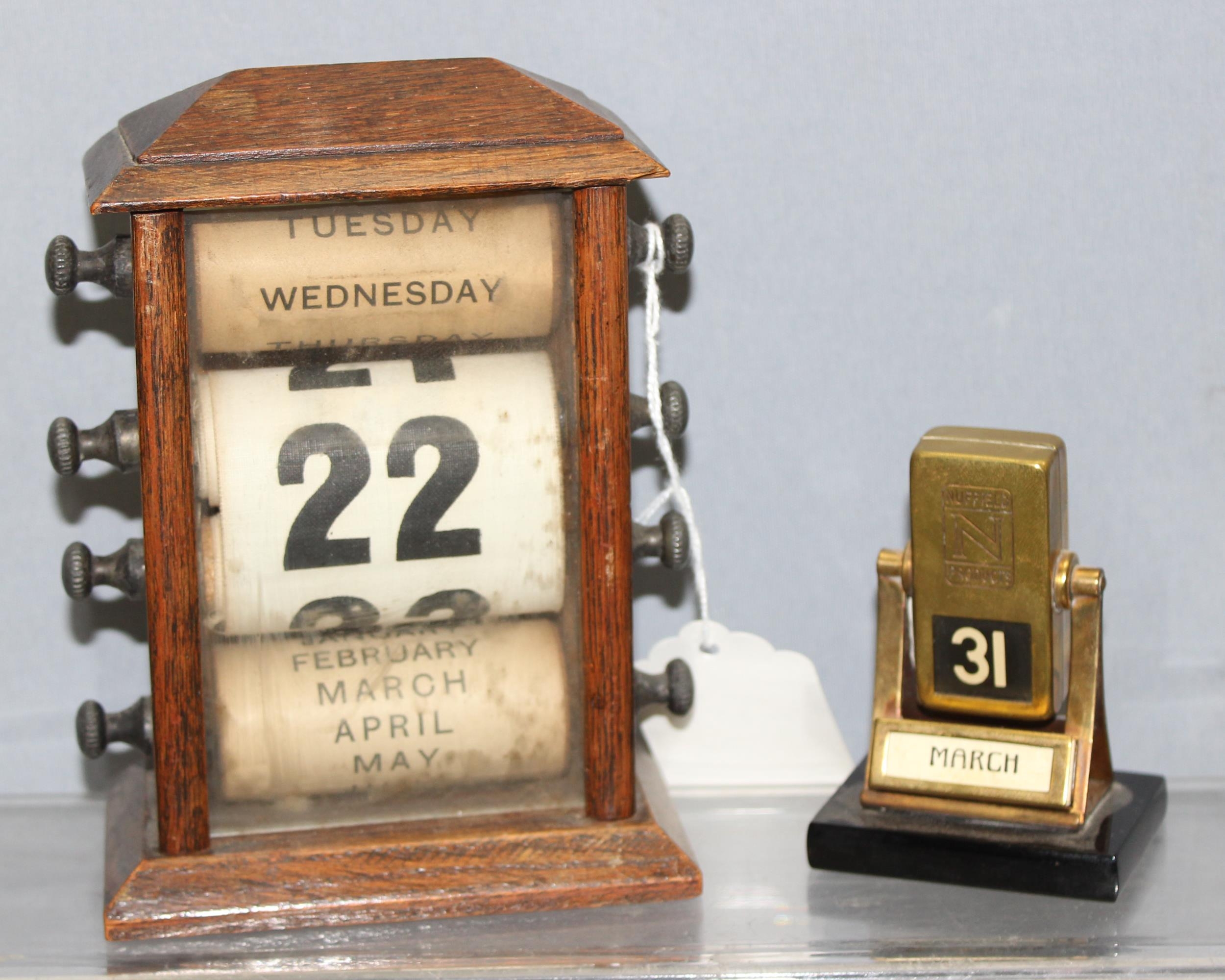 Antique perpetual desk calendar in oak glazed case and a smaller brass ...