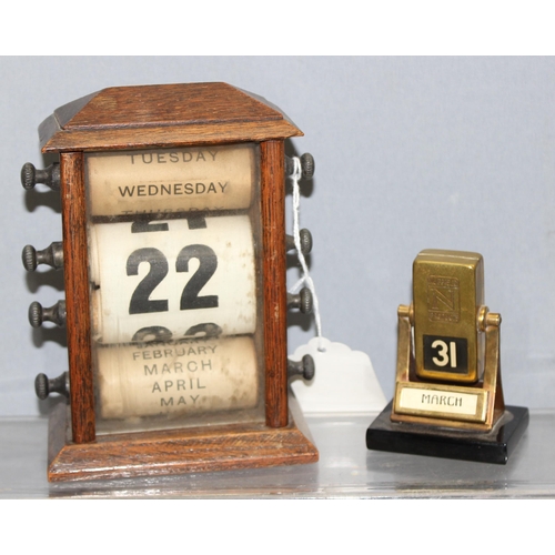 Antique perpetual desk calendar in oak glazed case and a smaller brass ...