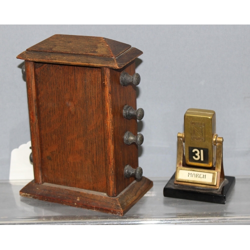 Antique perpetual desk calendar in oak glazed case and a smaller brass ...