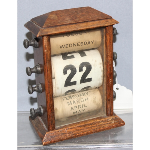 Antique perpetual desk calendar in oak glazed case and a smaller brass ...
