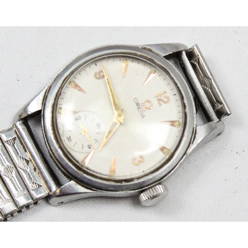 A vintage steel cased Omega wristwatch with hand wind mechanical ...
