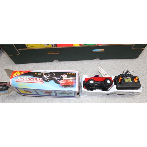 A large qty of wooden Brio style toys to inc trains, buildings and tracks