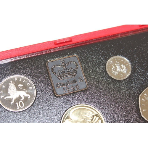 Ten assorted Royal Mint uncirculated proof coin sets in the luxury red ...