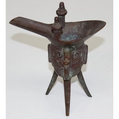 A Chinese metal libation cup, Chueh type of Shang Dynasty style, made ...