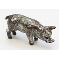 A cast silver model of a pig, marked for London import 1990, 35mm wide ...