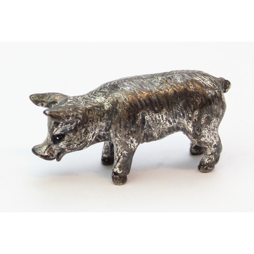 A cast silver model of a pig, marked for London import 1990, 35mm wide ...