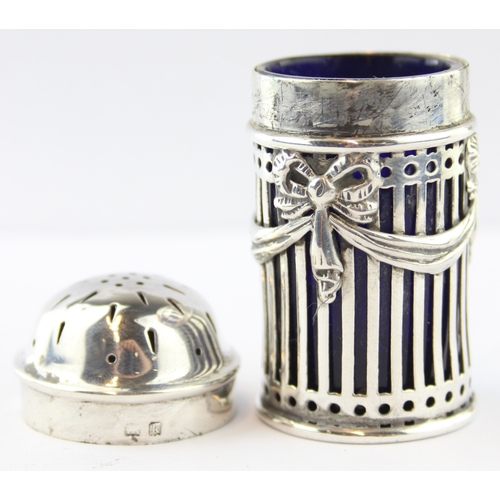[124.74g] - an Edwardian three piece silver cruet set with pierced bow ...