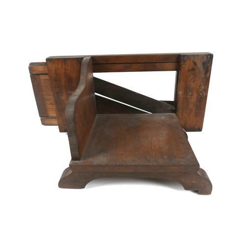 A Victorian / Edwardian bread slicer, with wooden frame metal fittings ...