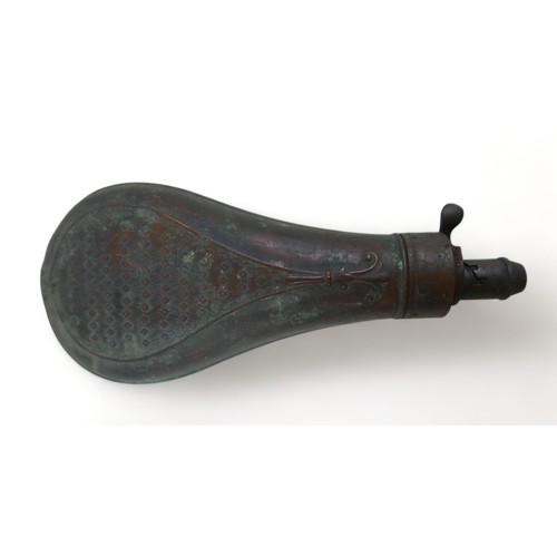 A brass and copper black powder flask and a horn shot flask, shot flask ...