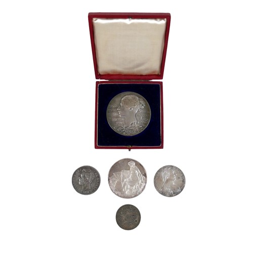 A group of five silver coins and medals, comprising a silver ...