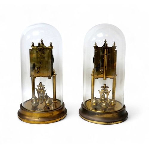 Three brass clocks, comprising two brass torsion clocks, both ...