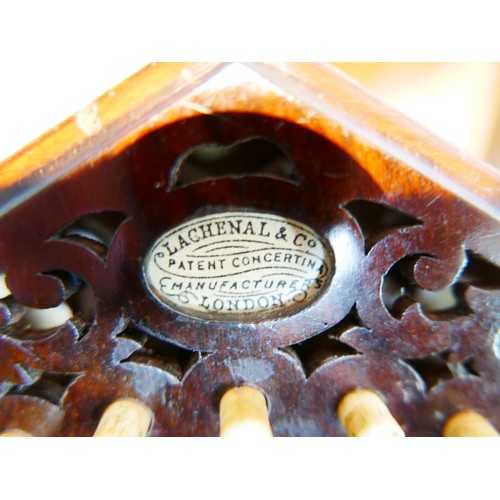 A Lachenal & Co. C/G concertina, with steel reeds, 20 bone keys, serial ...