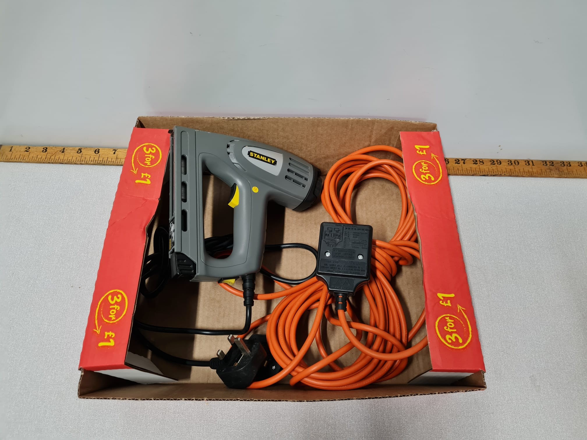 Stanley Sharpshooter TRA 700 electric staple gun with extension cable.