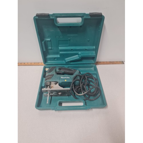 Makita jigsaw in case.