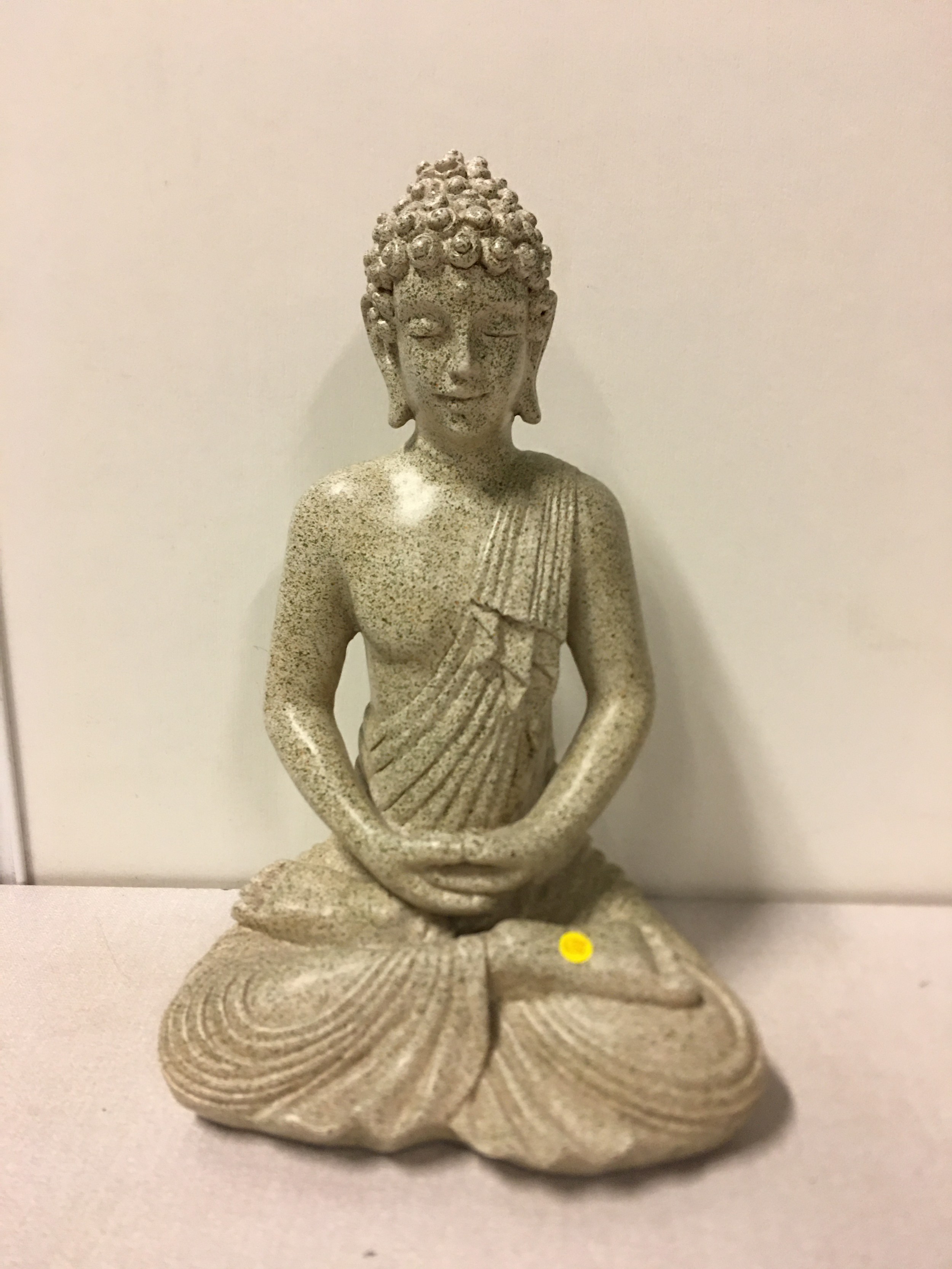 Plastic Buddha statue. 29cm h