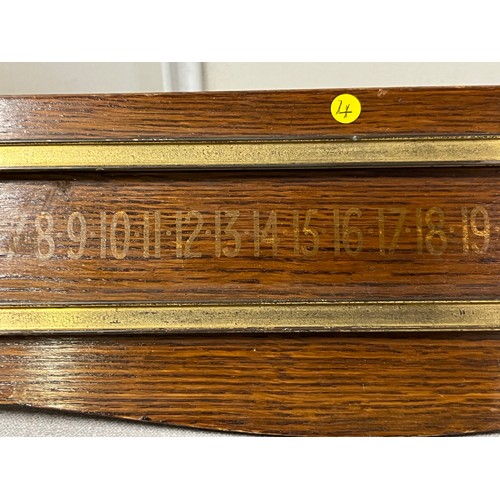 Vintage wood and brass snooker scoreboard.