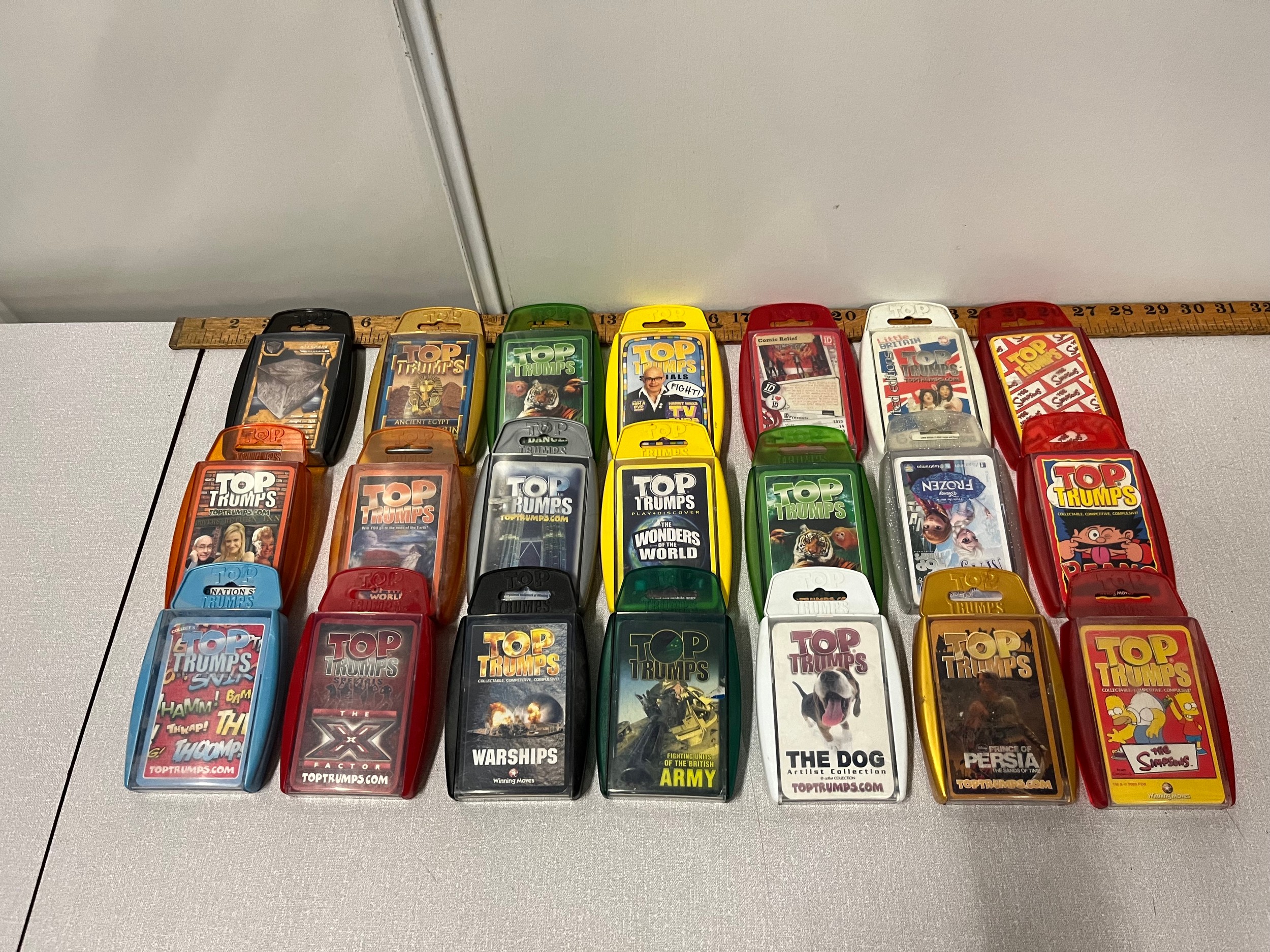21 x vintage top trumps cards to include the simpsons, warships ...