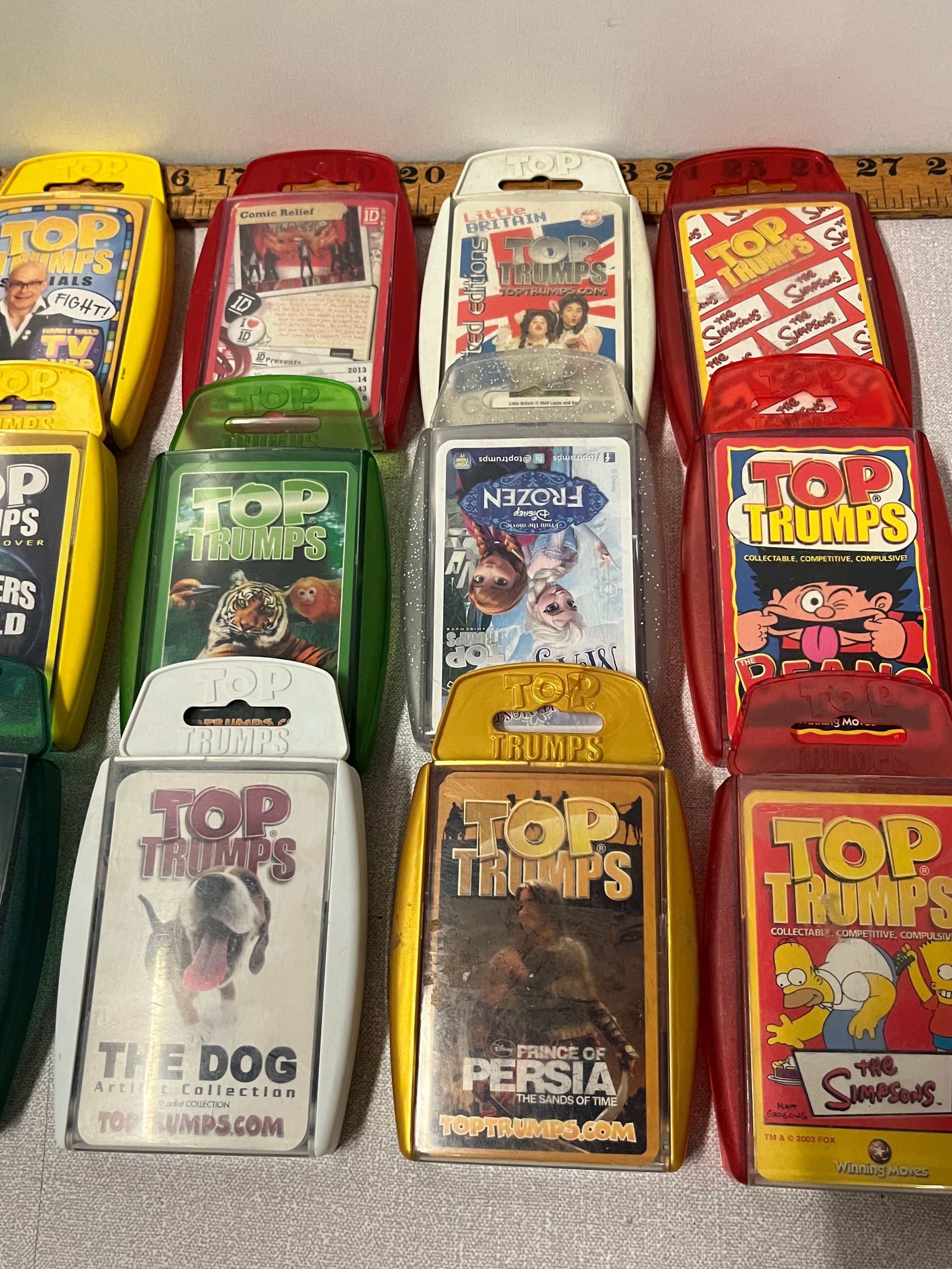 21 x vintage top trumps cards to include the simpsons, warships ...