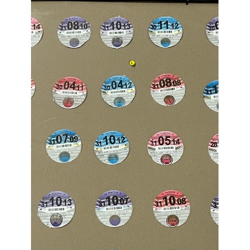 quantity of tax discs framed