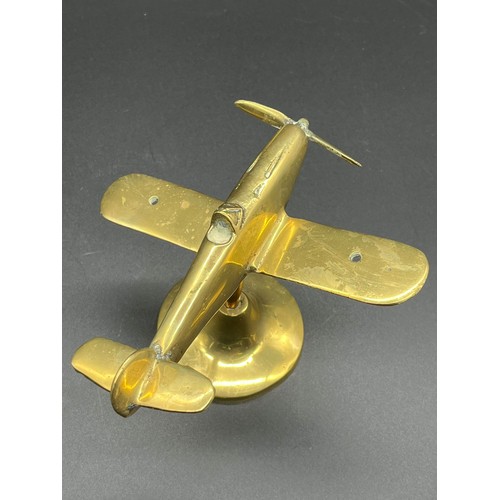 2 Brass trench art spitfires on stands.