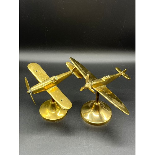 2 Brass trench art spitfires on stands.