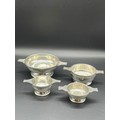 4 assorted pewter quaiches.